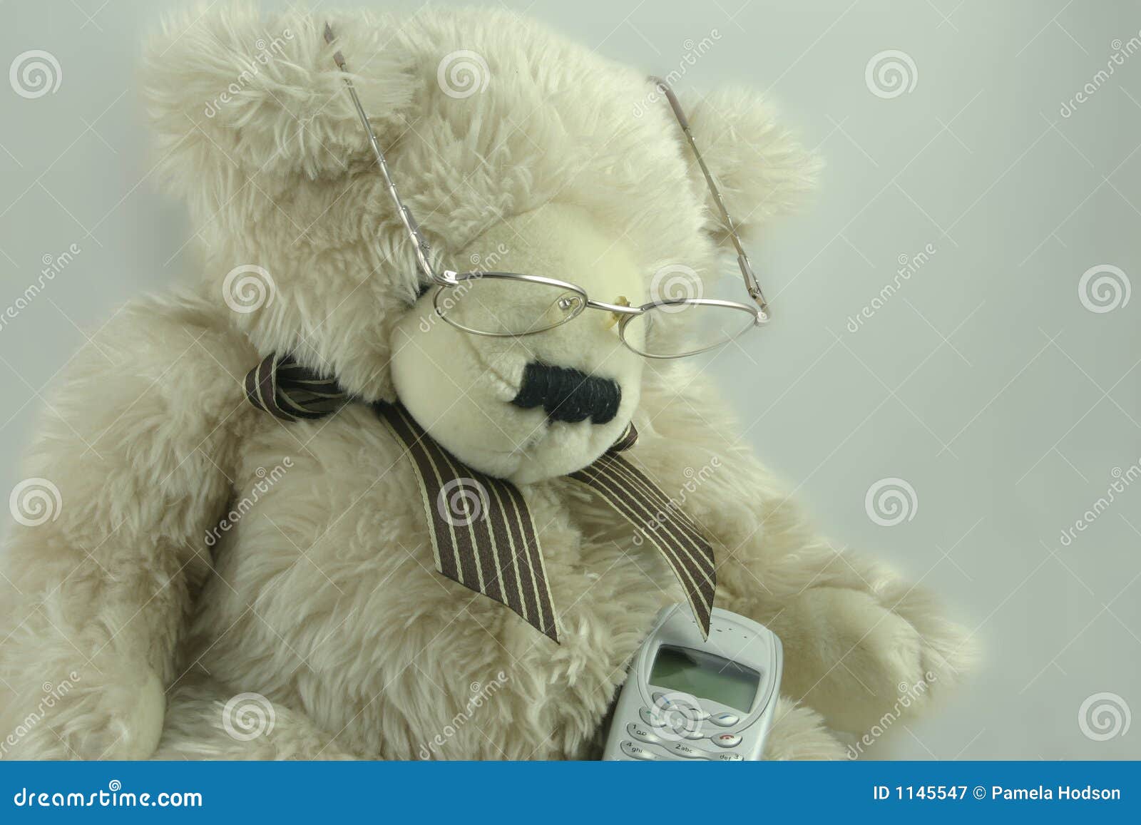 Teddy wants to make a call stock image. Image of detail - 1145547