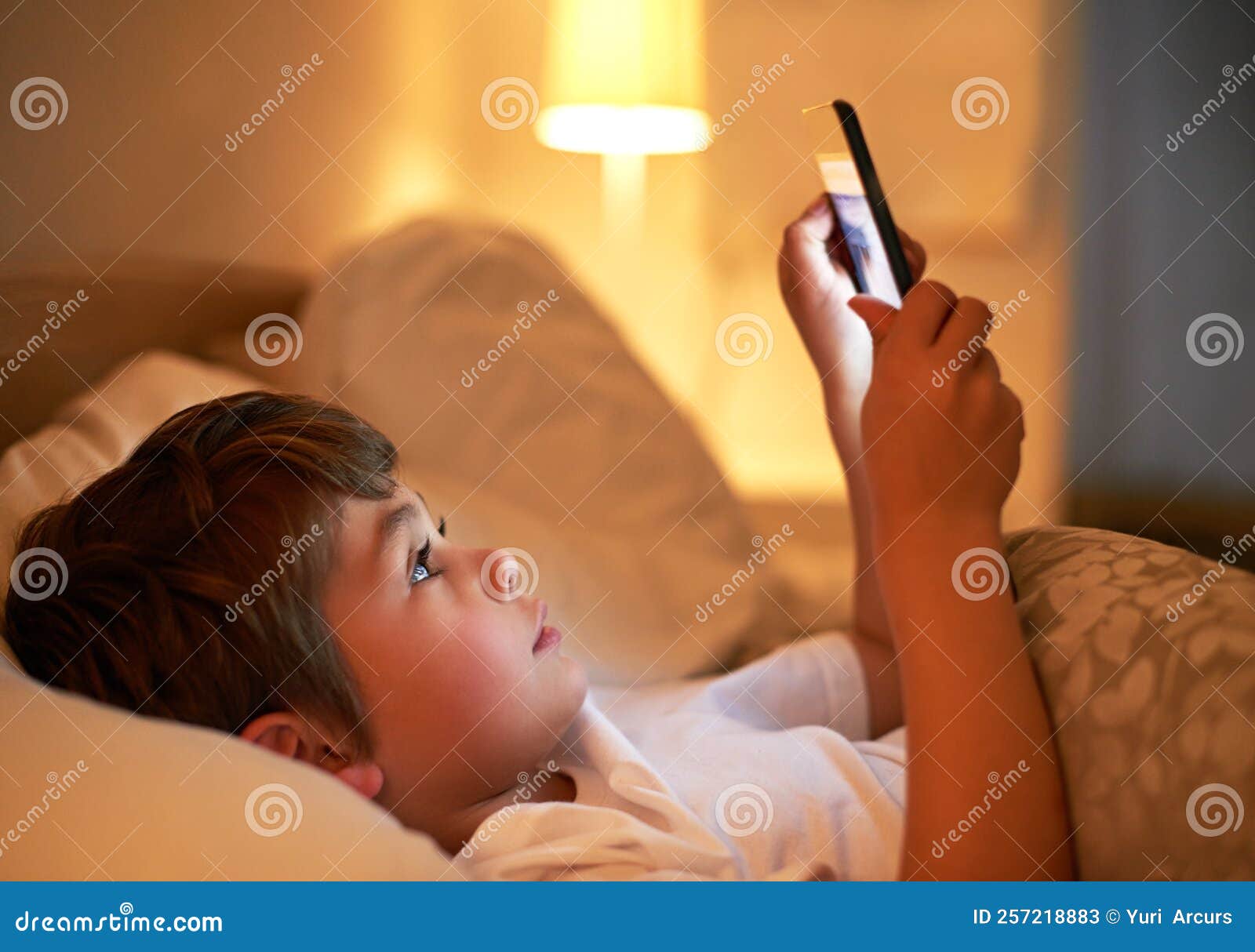 From Teddybears To Tablets. a Young Boy Using a Digital Tablet while ...