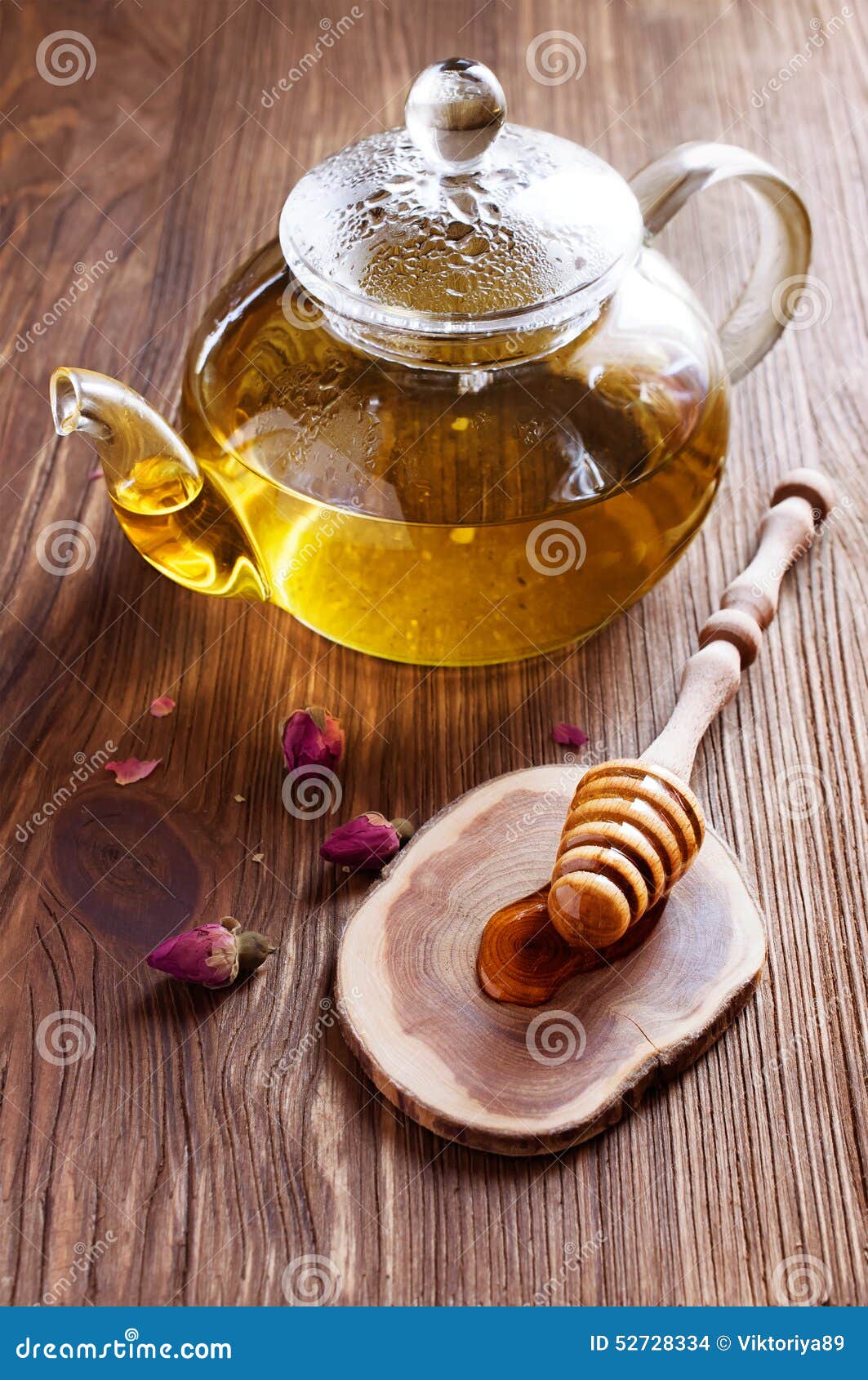 Tee in Einer Glasteekanne Mit Honig Und Rosen Stockfoto - Bild von holz ...