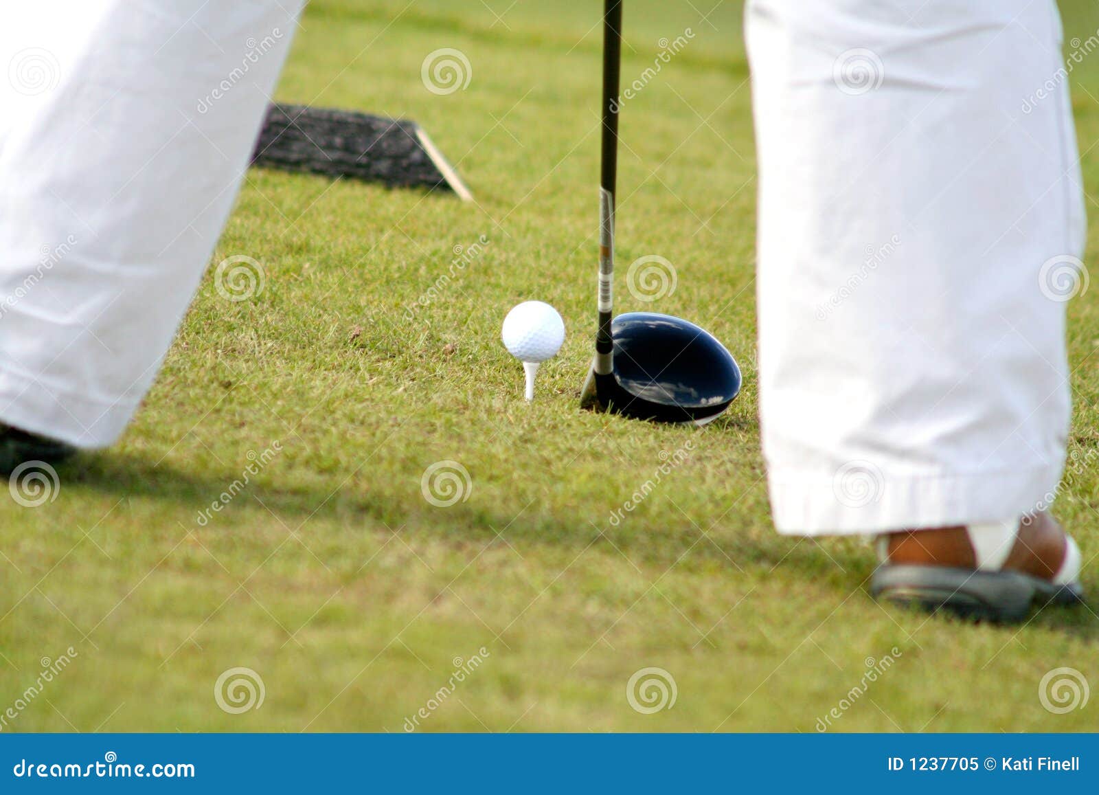 Tee off stock image. Image of grass, hole, ball, golfer - 1237705