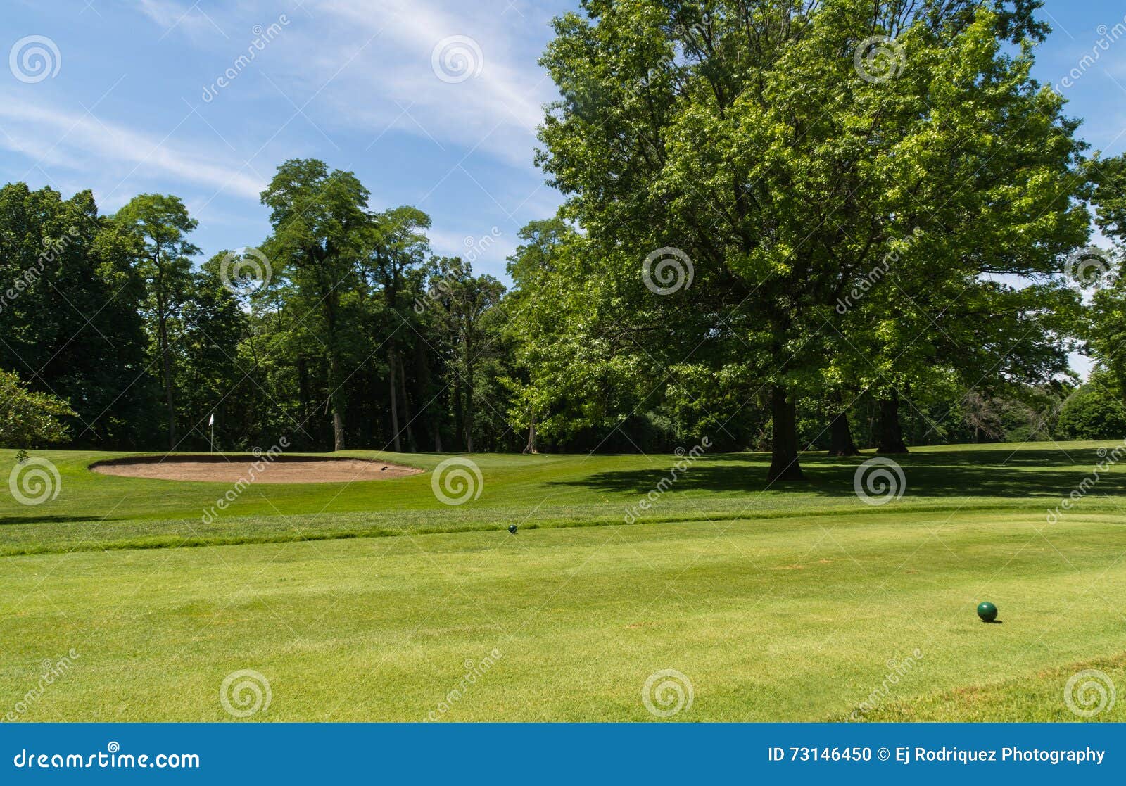 Tee off on golf course. stock photo. Image of cloud, golfing - 73146450