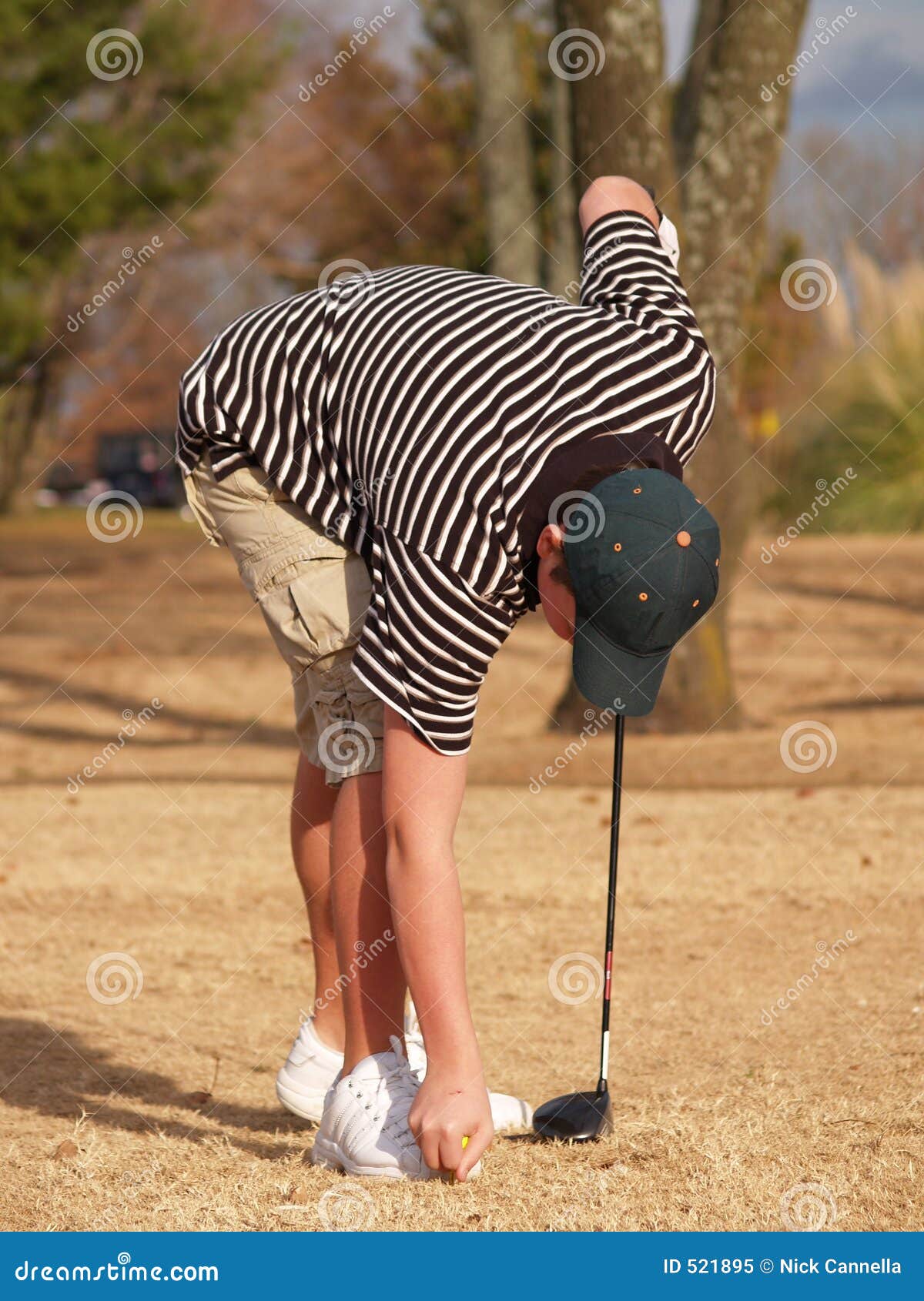 Tee Up the Golf Ball stock image. Image of teen, golfing - 521895