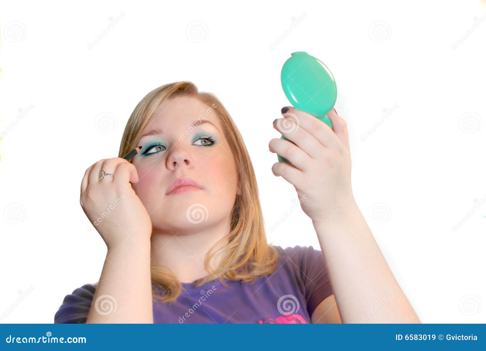 Teen applying makeup stock image. Image of female, mirror - 6583019