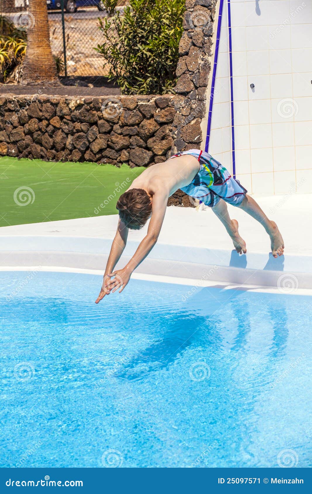 Teen Boy Jumping in the Blue Pool Stock Image - Image of club, action ...