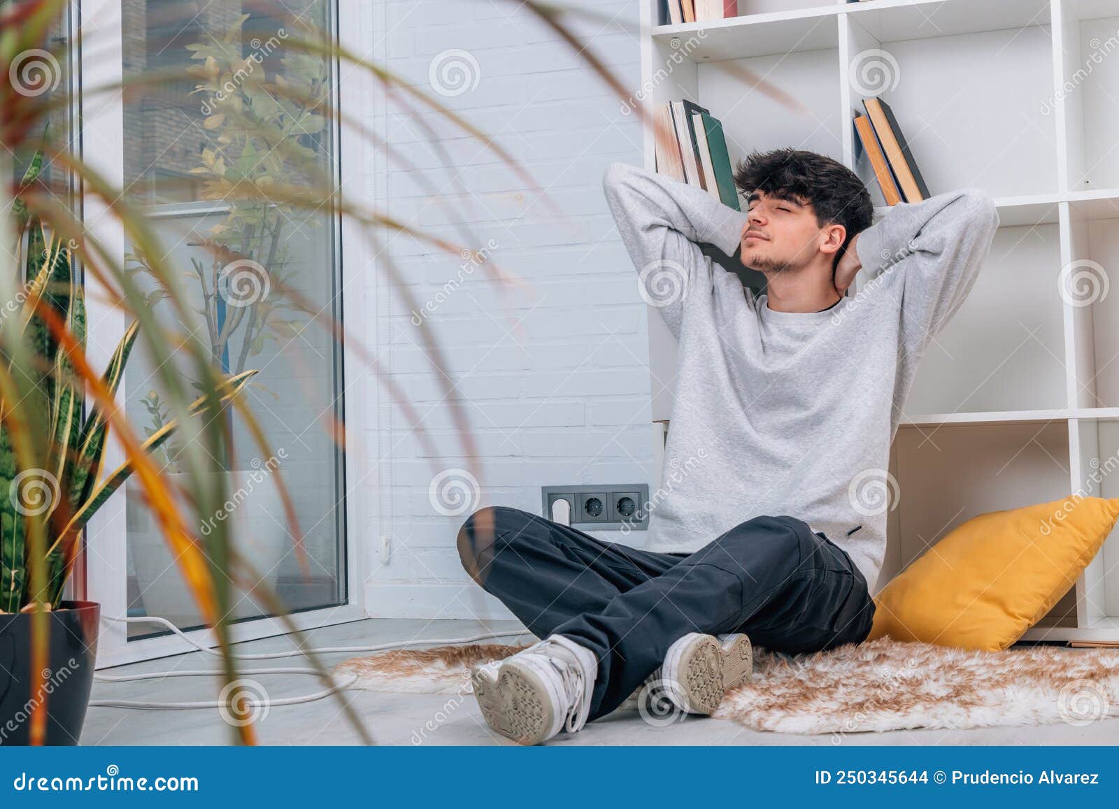 Teen boy resting relaxed stock photo. Image of dreaming - 250345644