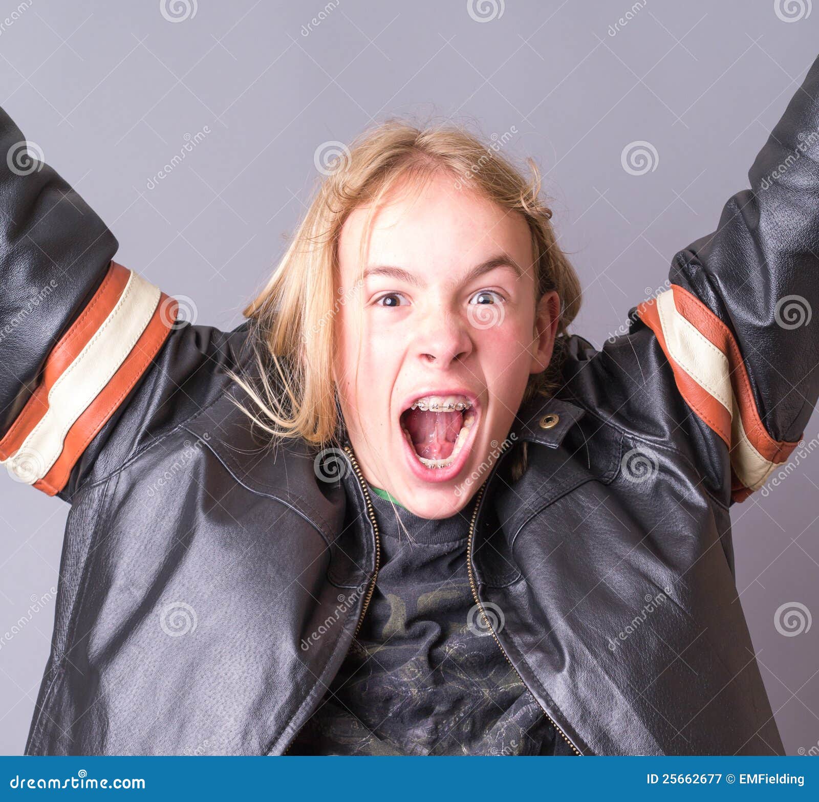 Teen Boy Rocking Out in Leather Jacket Stock Image - Image of rock ...