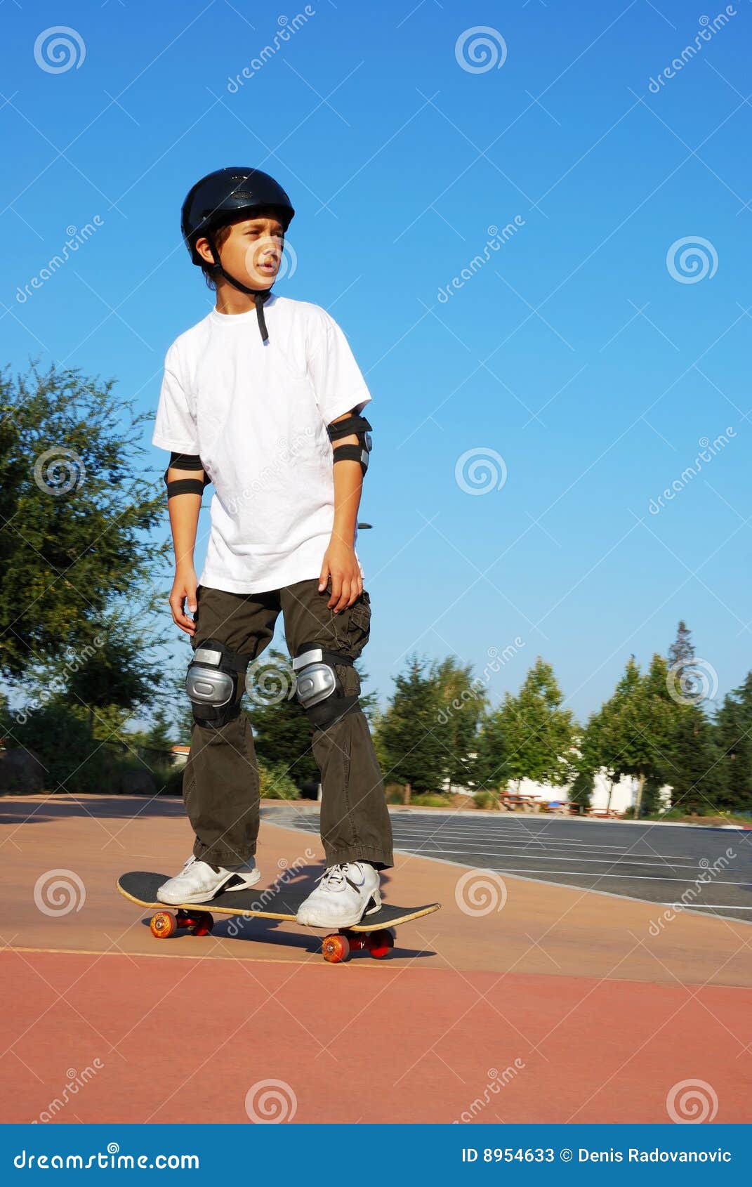 Teen Boy on Skateboard stock image. Image of jeans, male - 8954633