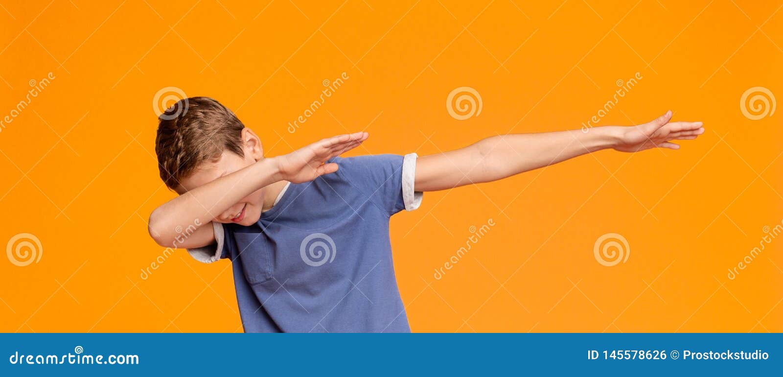 Teen Boy Throwing Dab Move, Orange Background Stock Photo - Image of ...