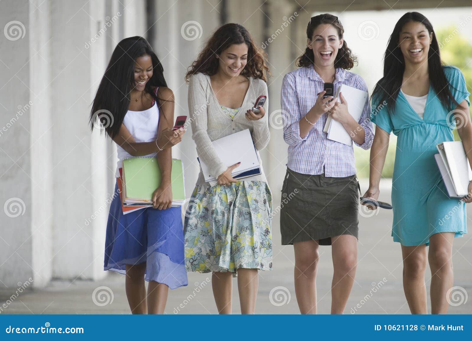 Teen Female Students Texting Stock Photo - Image of group, brown: 10621128
