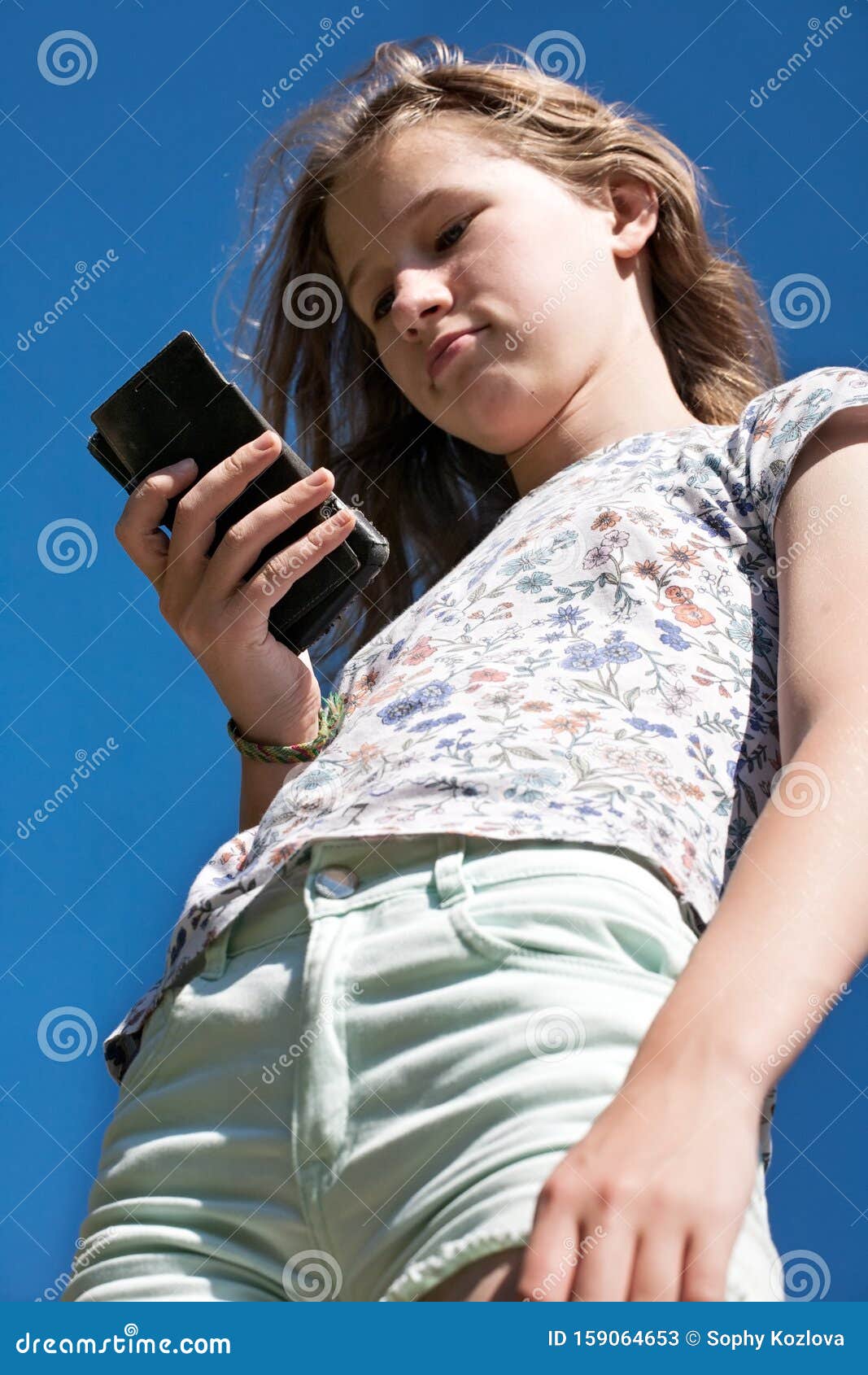 Teen Girl with Phone Mobile Close-up Bottom-up View Stock Image - Image ... Teen Girl with Phone Mobile Close-up Bottom-up View Stock Image - Image ...