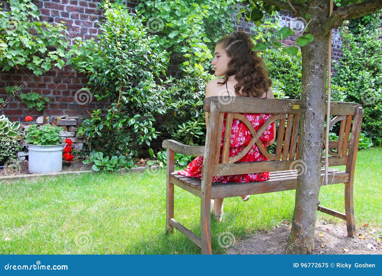 A Teen Girl Sitting In The Garden Stock Image Image Of Pose Sitting