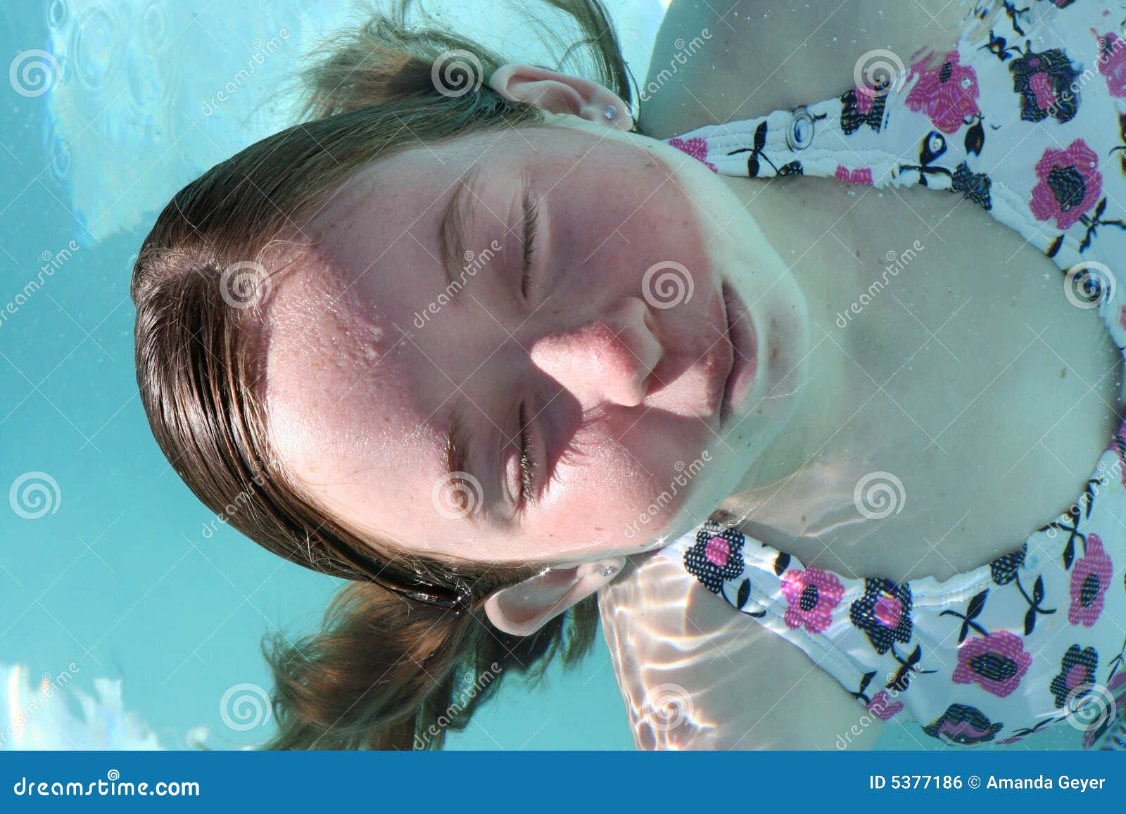 Teen girl submerging stock photo. Image of happy, pool - 5377186