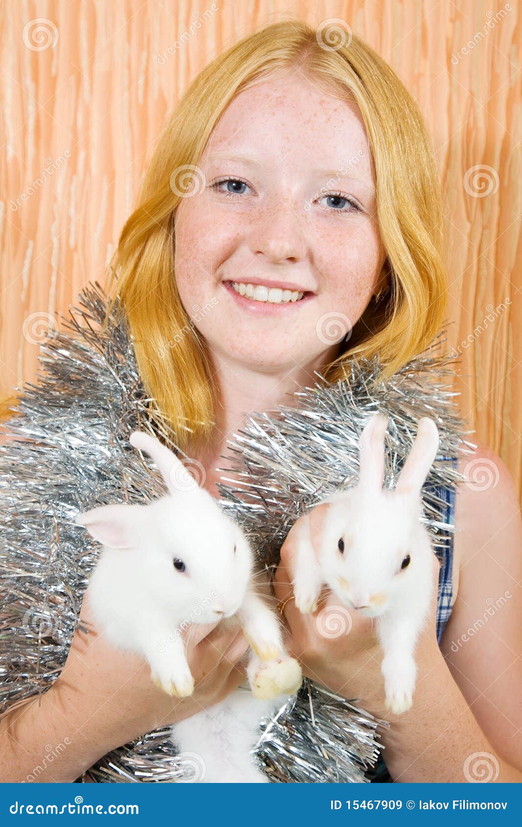 Teen girl with two rabbits stock image. Image of knick - 15467909