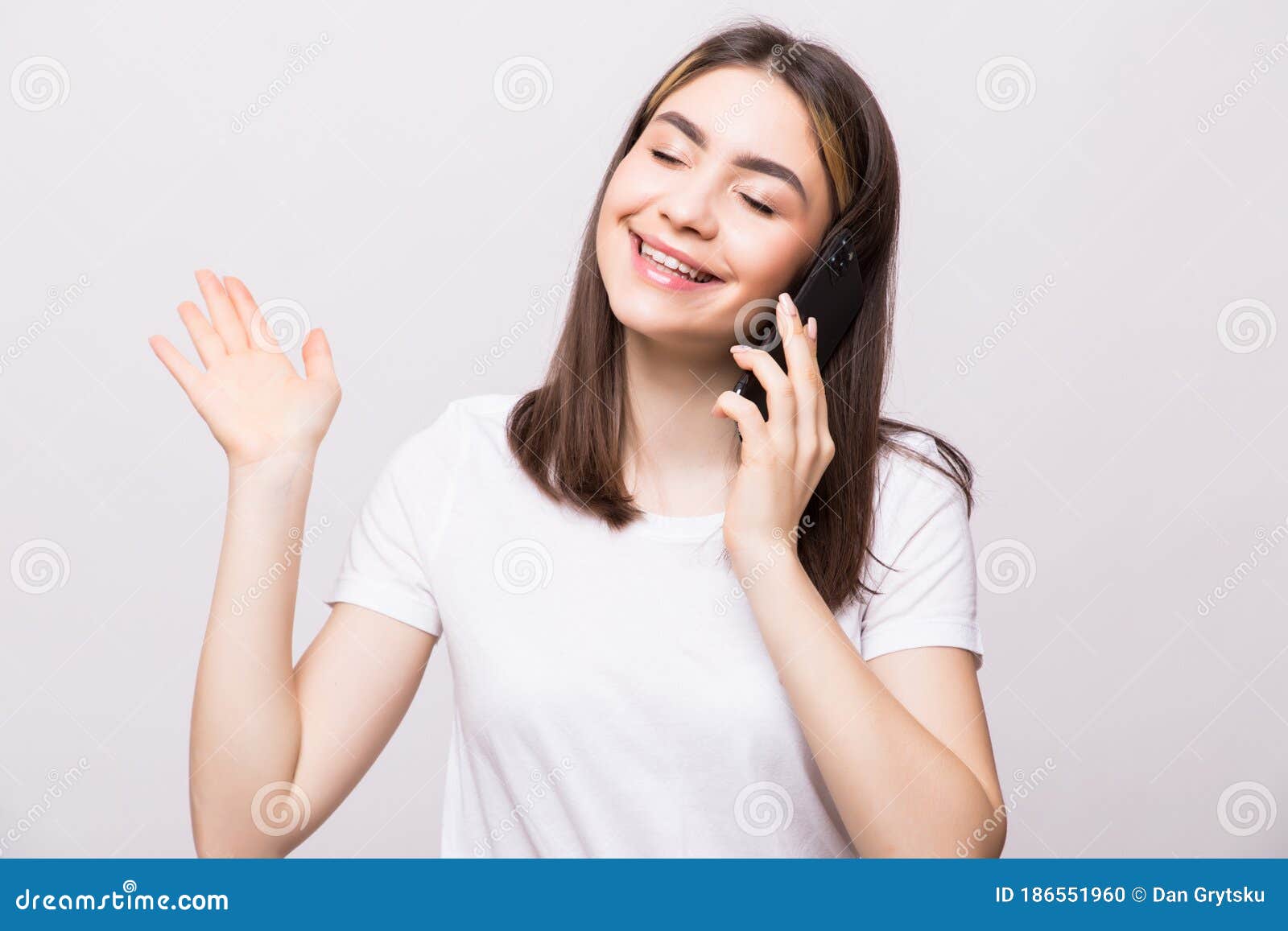 Teen Girl Using Cell Phone Isolated on White Background Stock Photo ...