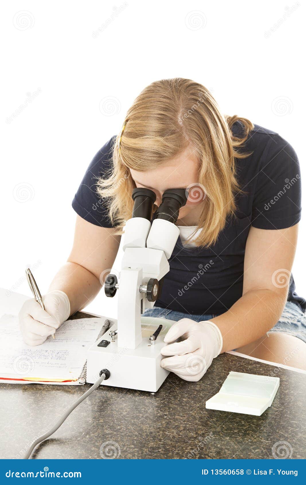 Teen Girl Using Microscope stock photo. Image of taking - 13560658