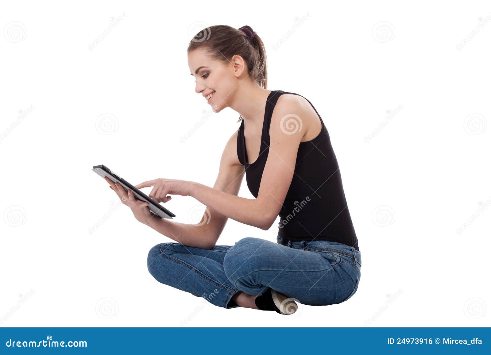 Teen girl using a tablet stock photo. Image of girl, person - 24973916