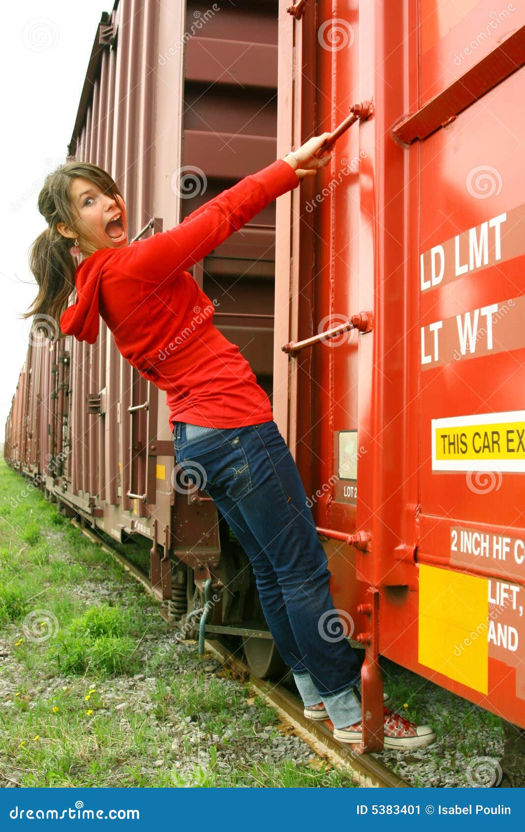 Teen hanging from train stock image. Image of sneakers - 5383401