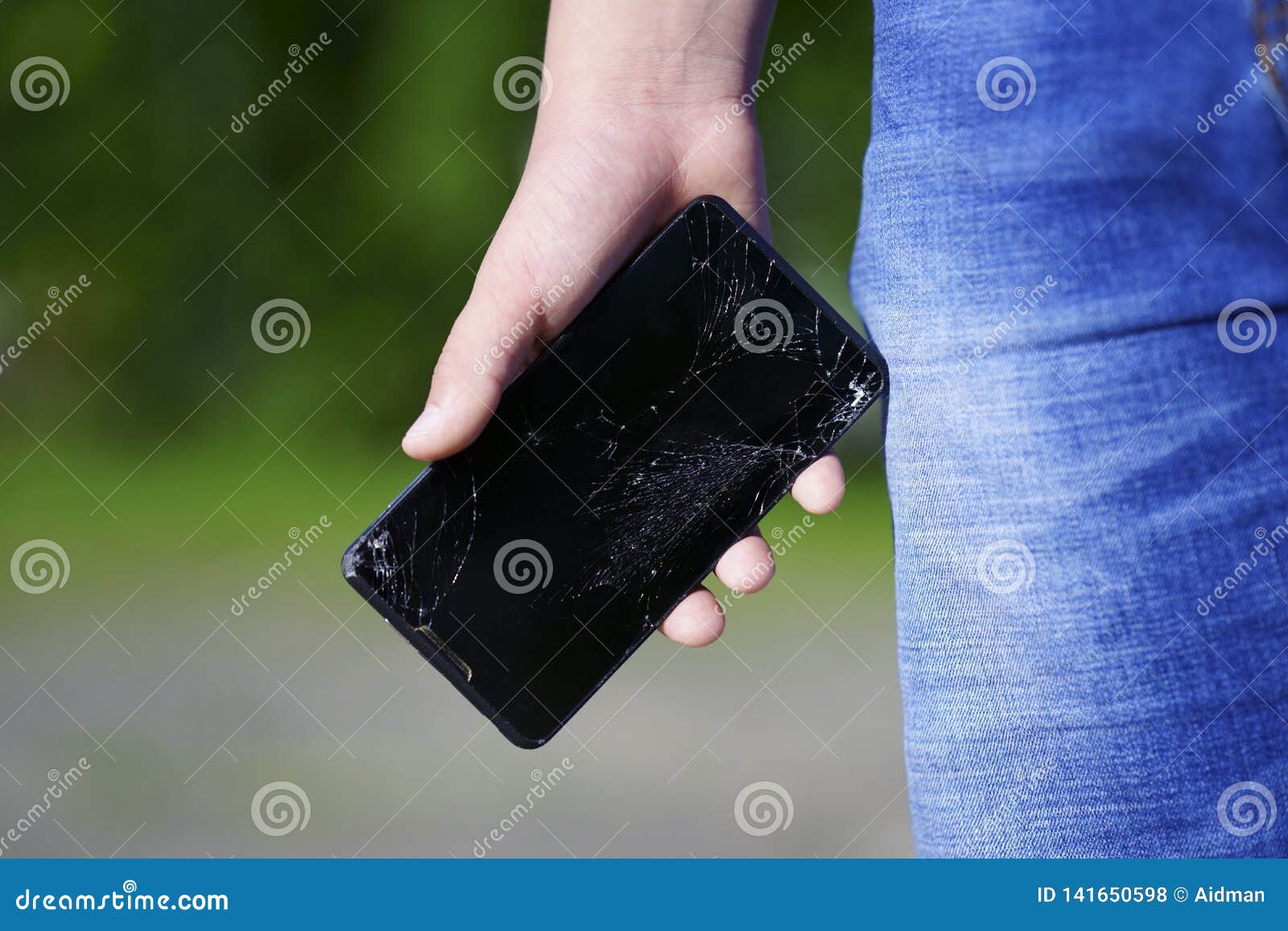 Teen is Holding Phone with Broken Screen after Falling Down Stock Photo ...