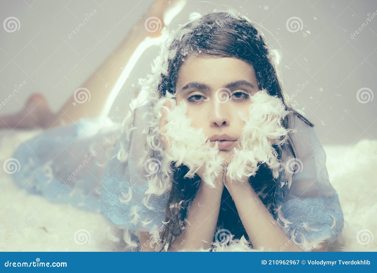 Teen In Nightie Lay On Bed While Feathers Fly Around Delicate Sensual