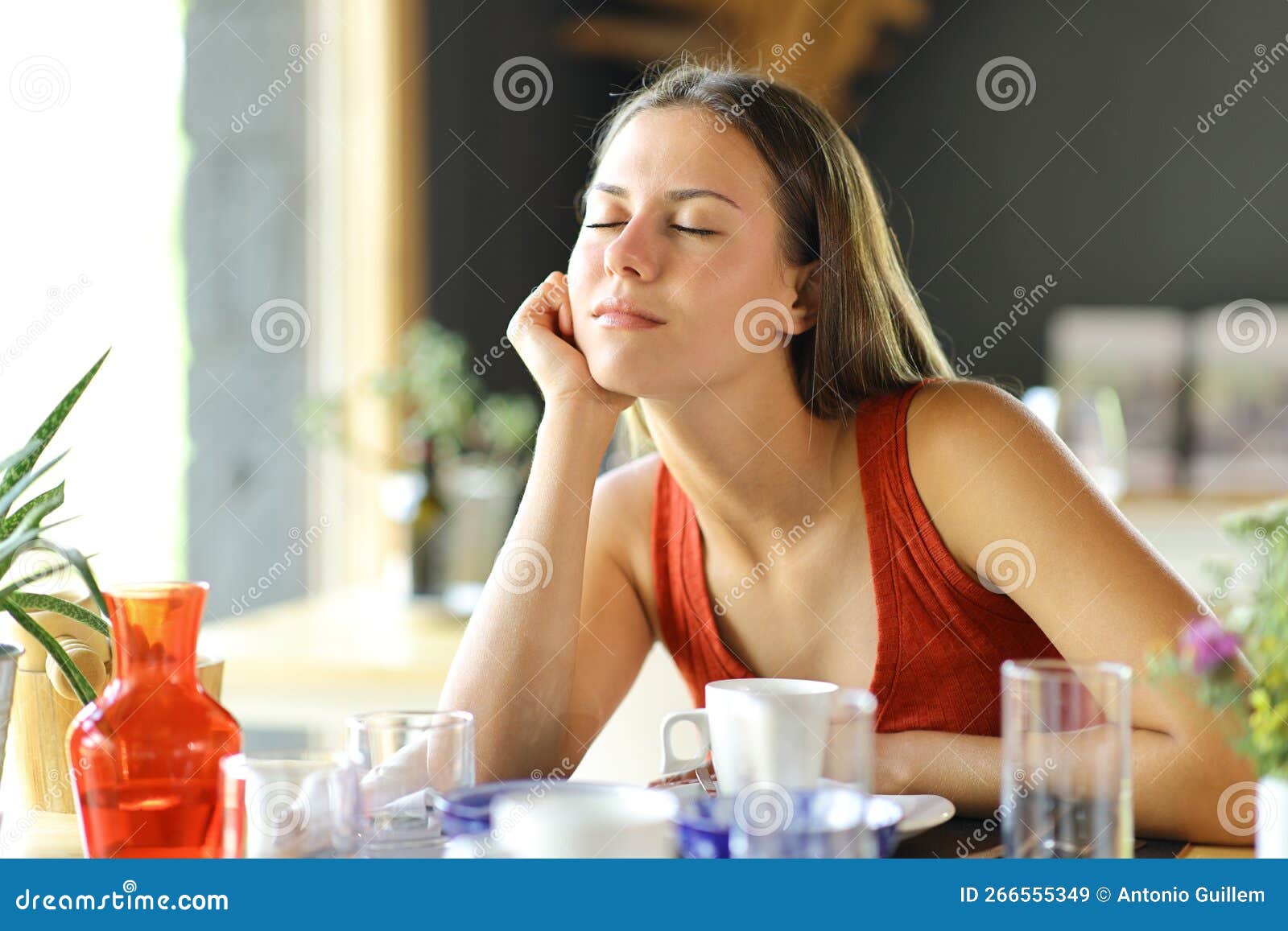 Teen Resting with Closed Eyes in a Restaurant Stock Image - Image of ...