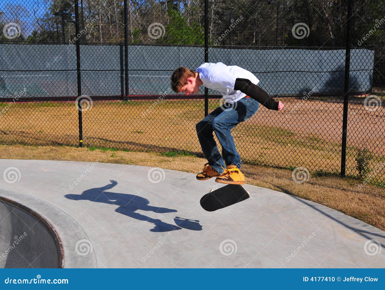 Teen Shadow Skater stock photo. Image of achievement, expert - 4177410