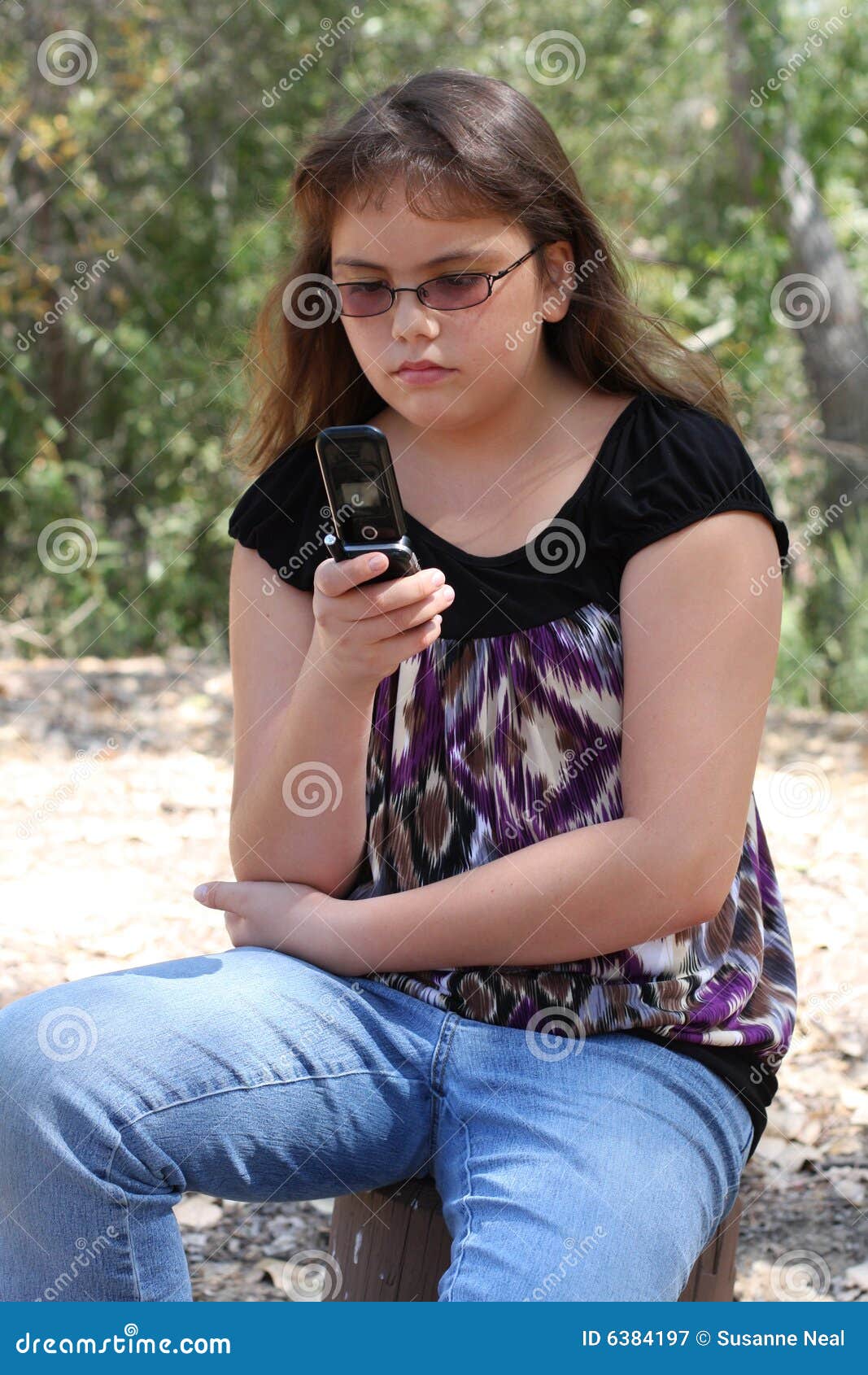 Teen texting on cell phone stock image. Image of outdoors - 6384197