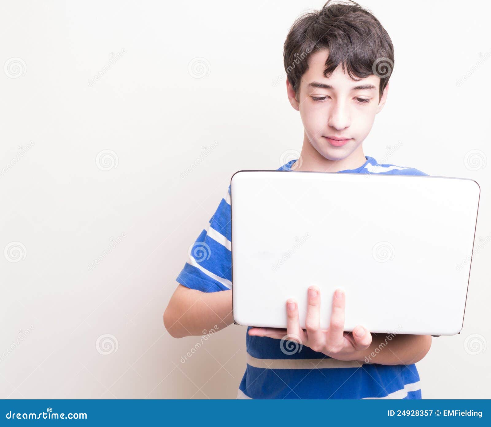 Teen using computer stock image. Image of laptop, surfing - 24928357