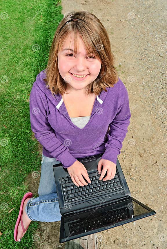 Teen Using Laptop stock image. Image of wide, modern - 16055735
