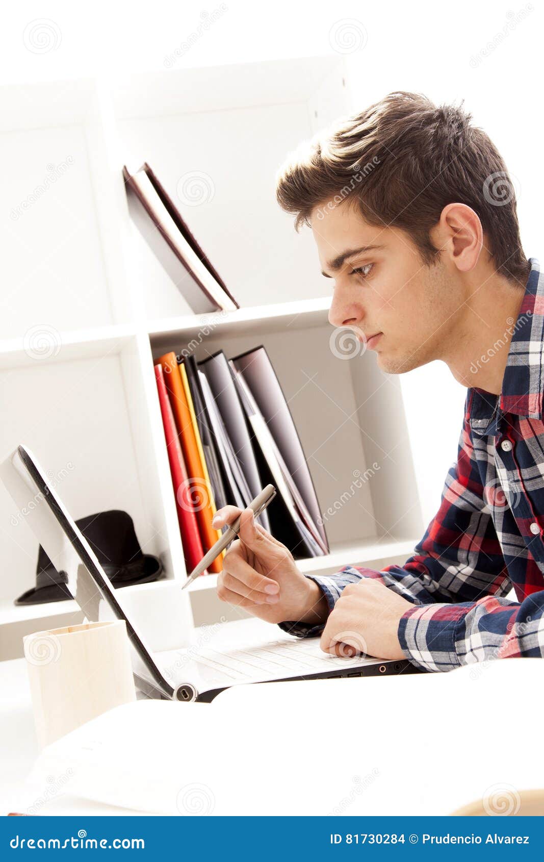Teen working on computer stock photo. Image of hand, home - 81730284