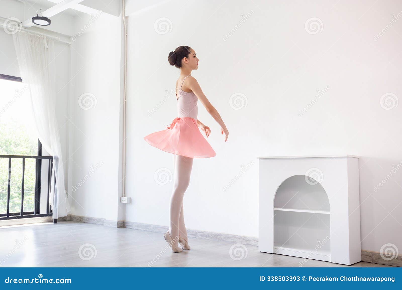 Teenage Ballerina Practices Her Stretching Routine in Studio before ...