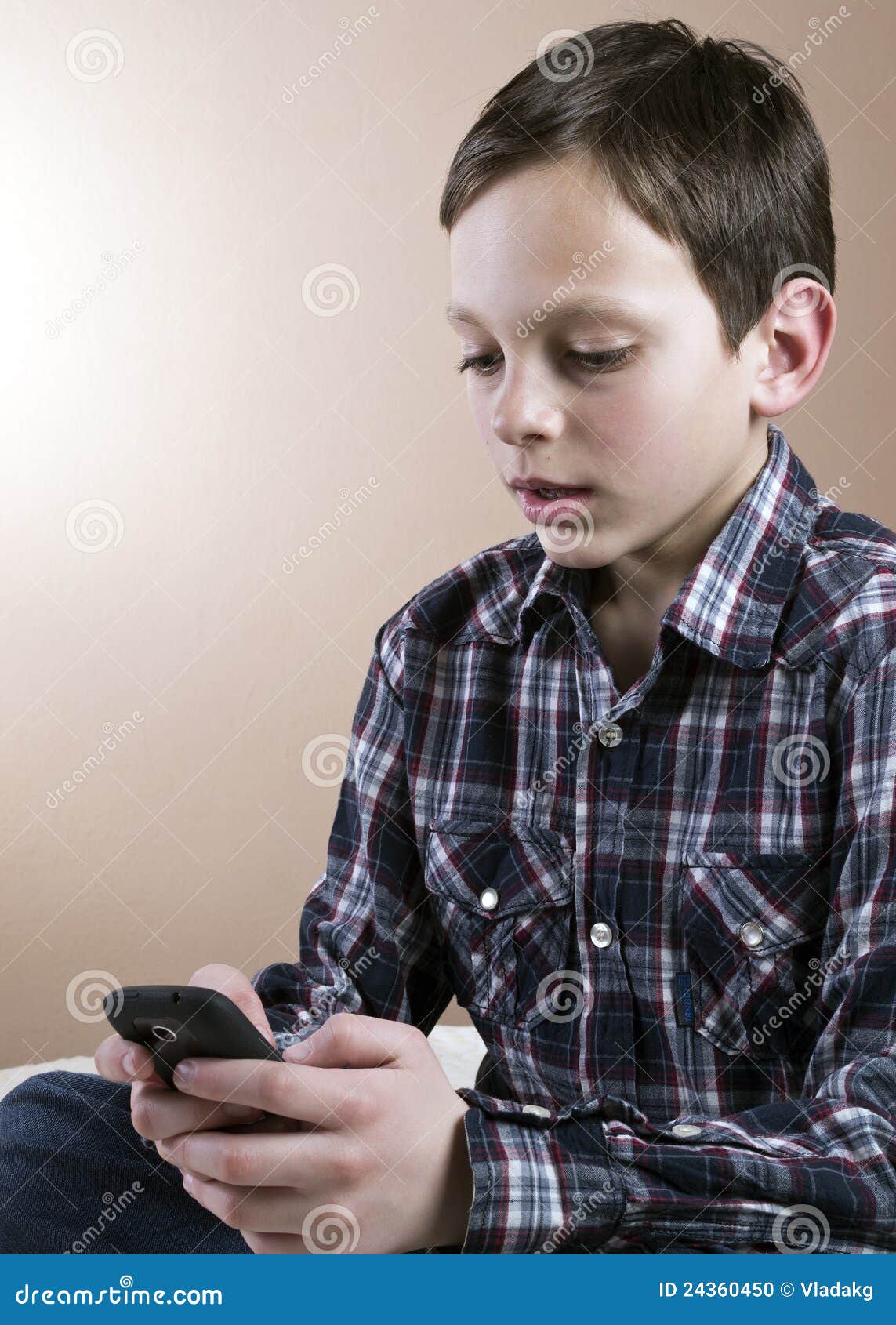 Teenage Boy with Cell Phone Stock Photo - Image of background, looking ...