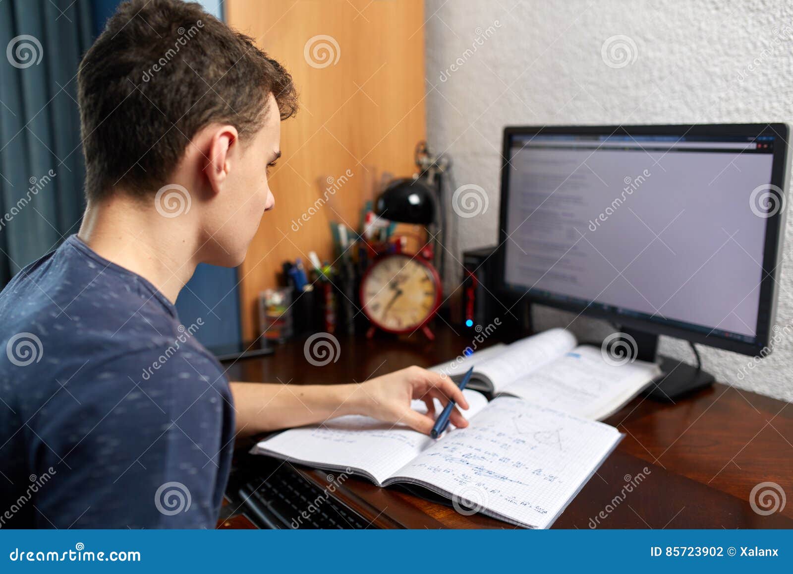 Teenager Doing Homework with Computer Stock Photo - Image of grade ...