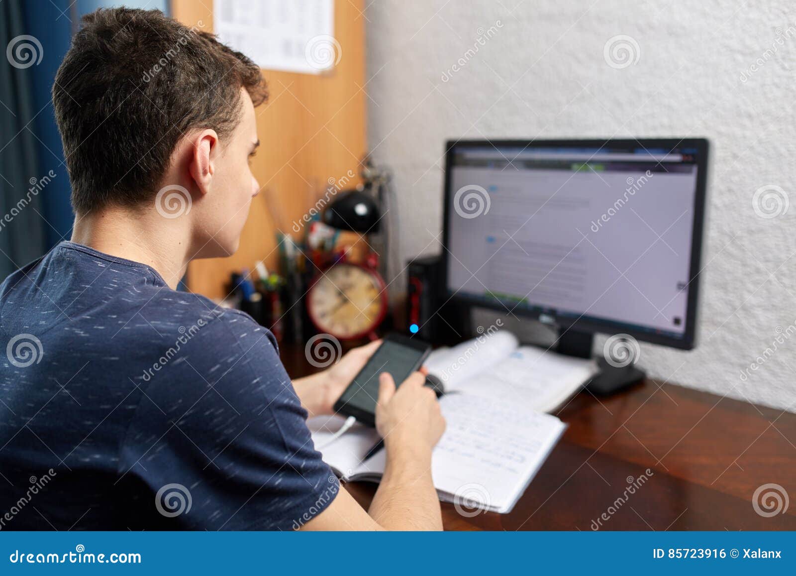 Teenager Doing Homework with Computer Stock Photo - Image of schoolboy ...