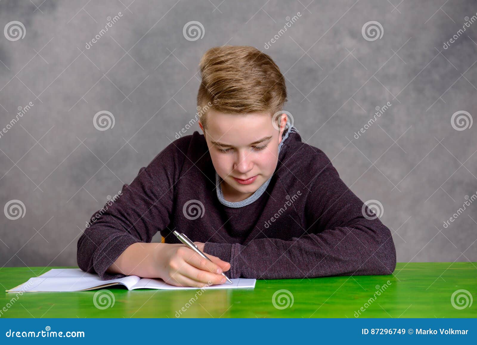 Teenage boy doing homework stock image. Image of learning - 87296749