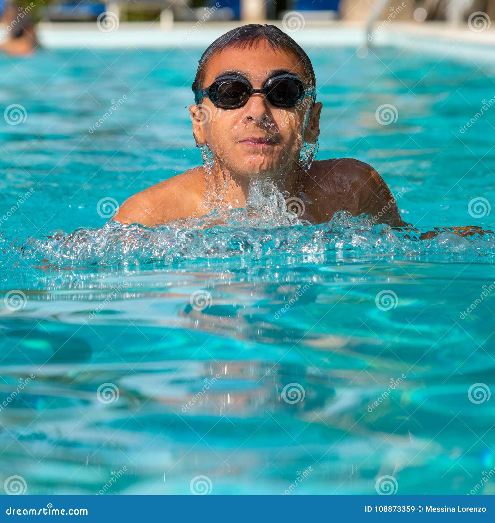 Teenage Boy Emerging from the Water Surface Stock Image - Image of ...
