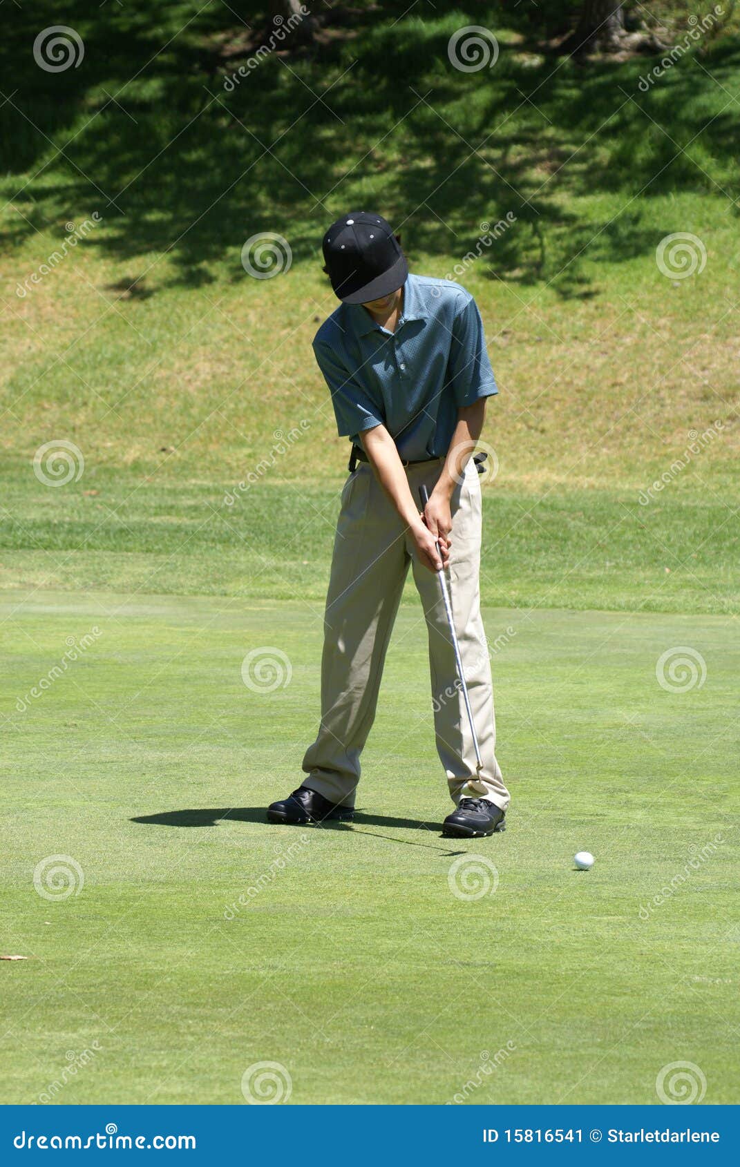 Teenage Boy Golfing stock image. Image of khaki, outdoors - 15816541