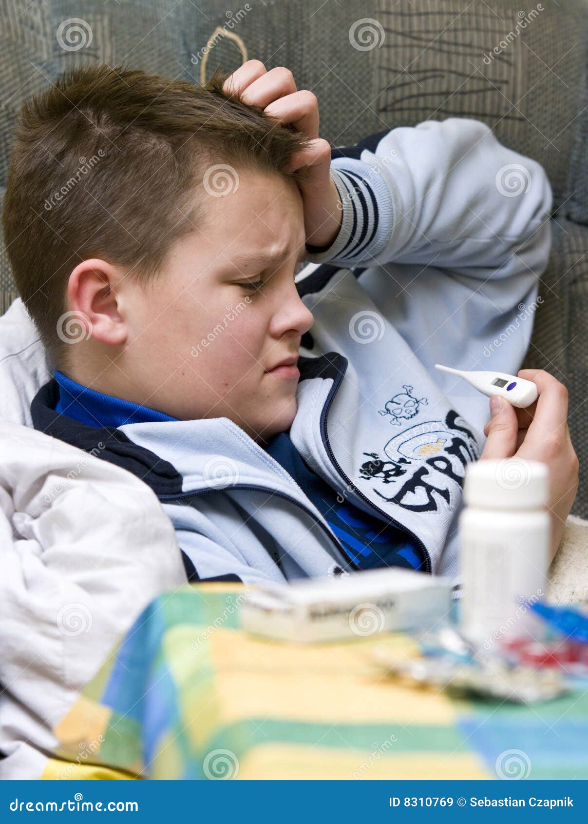 Teenage boy ill in bed stock image. Image of puzzled, teen - 8310769