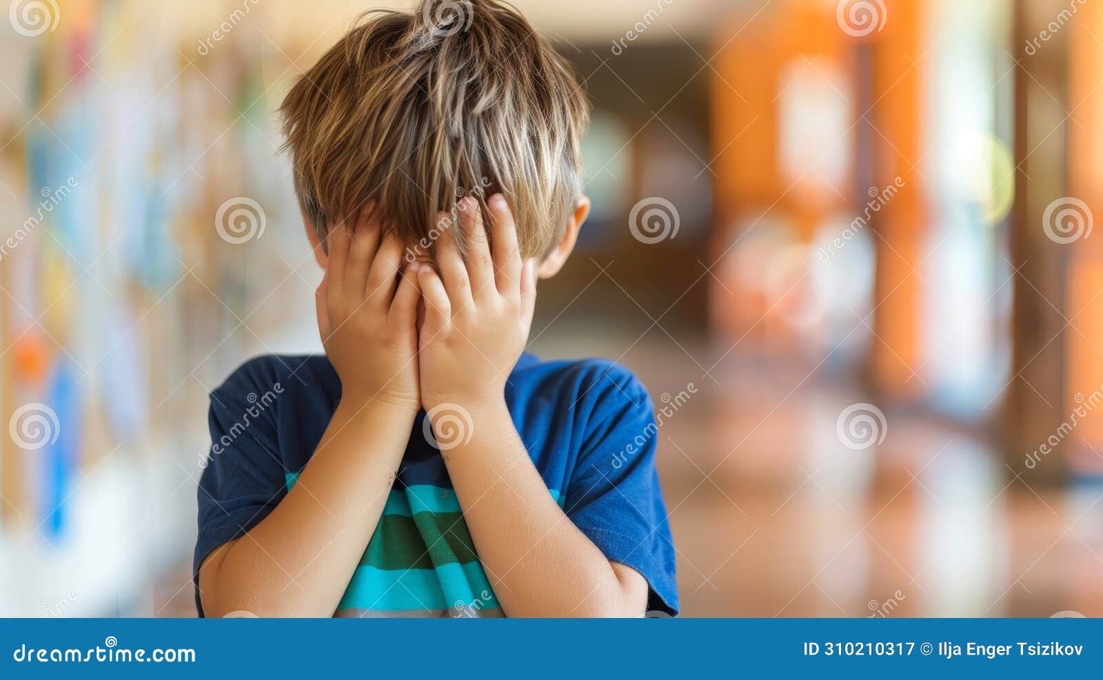 Teenage Boy with Learning Difficulties Crying in School Corridor ...