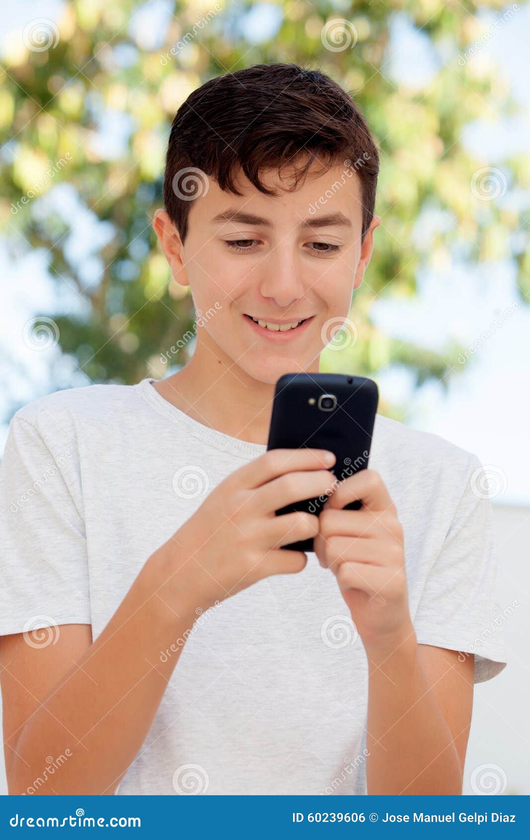 Teenage Boy Looking at the Mobile Stock Photo - Image of person, call ...