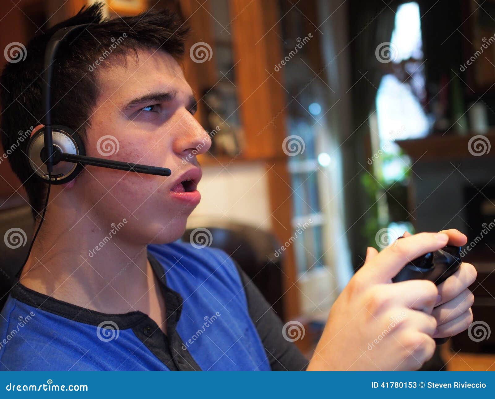 Teenage Boy Playing Video Game Stock Image - Image of teenage, playing ...