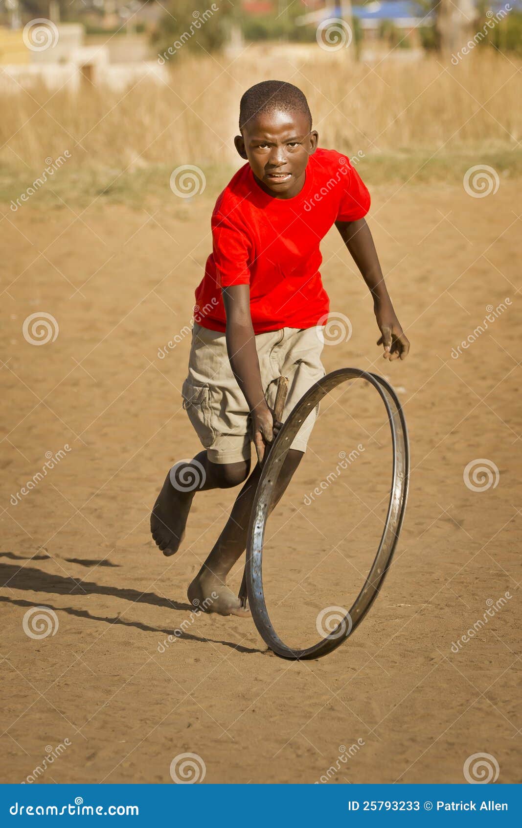 Teenage Boy Playing with Wheel - Head on Stock Image - Image of teens ...