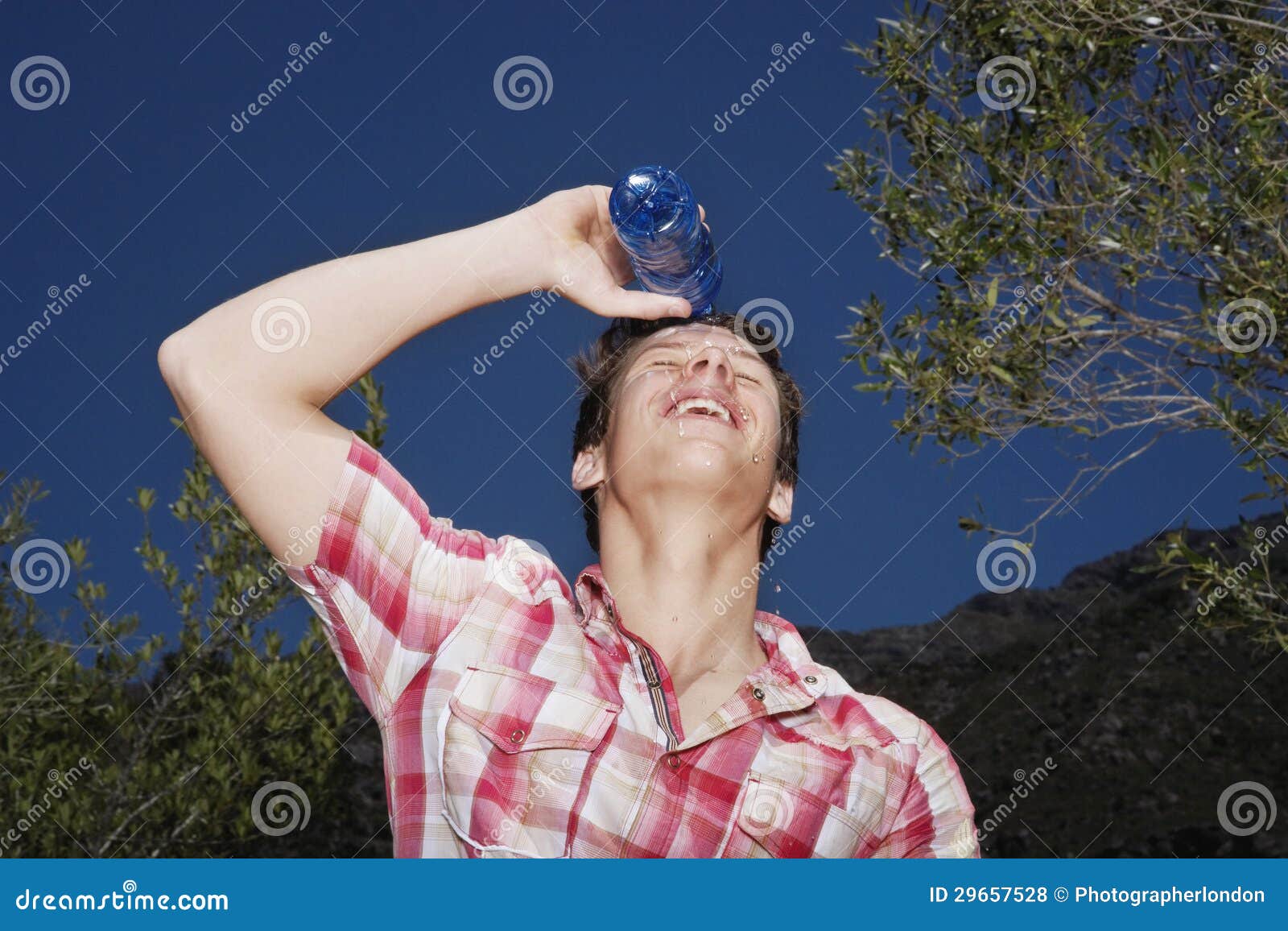 Teenage Boy Spilling Water on Face Stock Photo - Image of exhausted ...