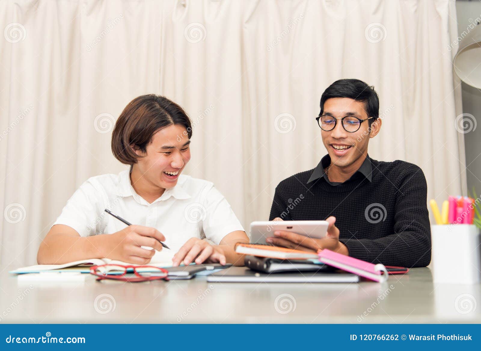 Teenage Student in Classroom with Tutor Stock Photo - Image of pencil ...