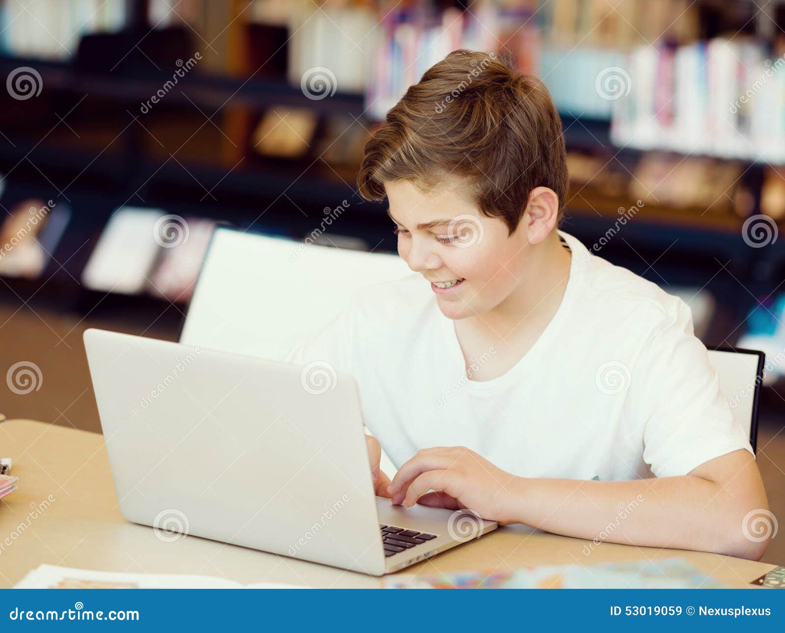 Teenage Boy with Tablet in Library Stock Image - Image of campus, child ...