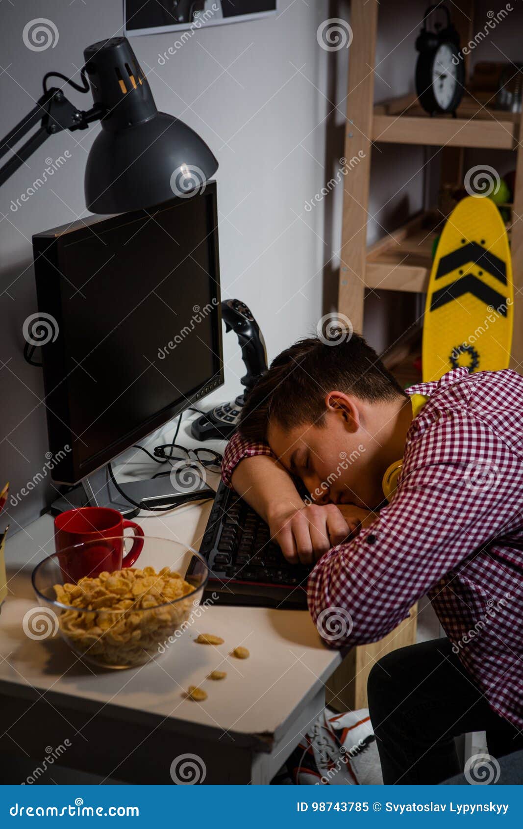 Teenage Boy Tired Falling Asleep at Computer Table. Stock Image - Image ...