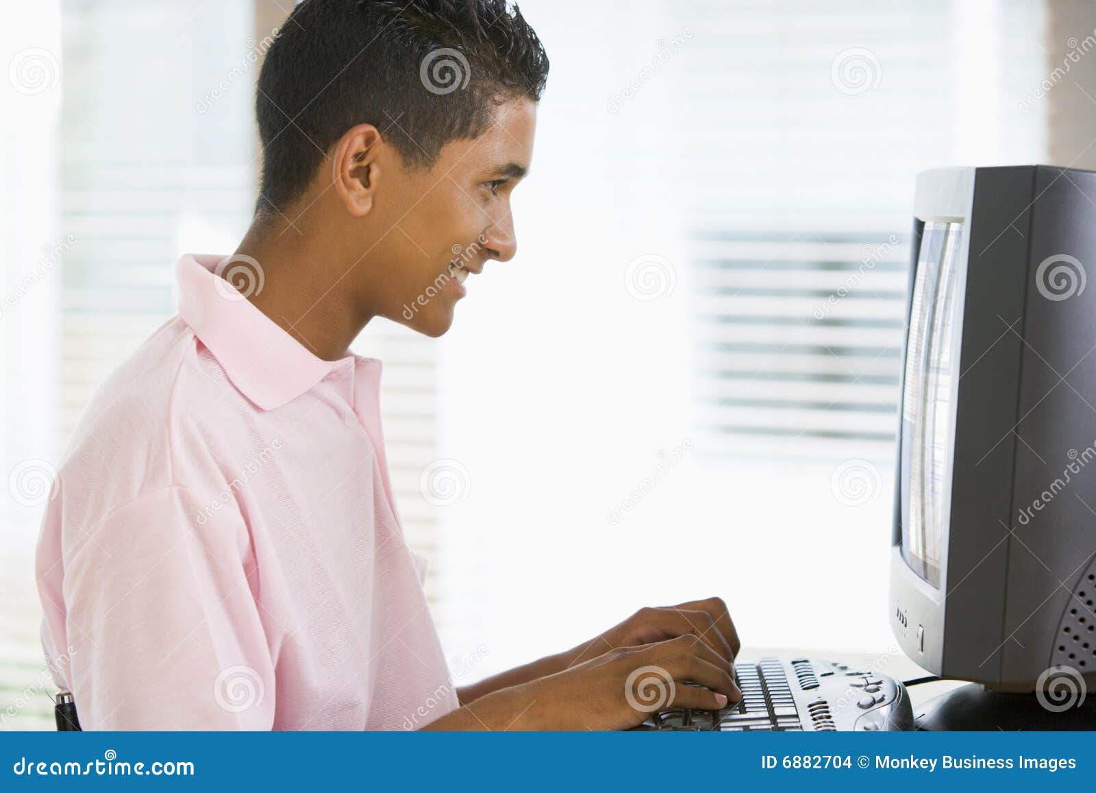 Teenage Boy Using Desktop Computer Stock Photo - Image of adolescence ...