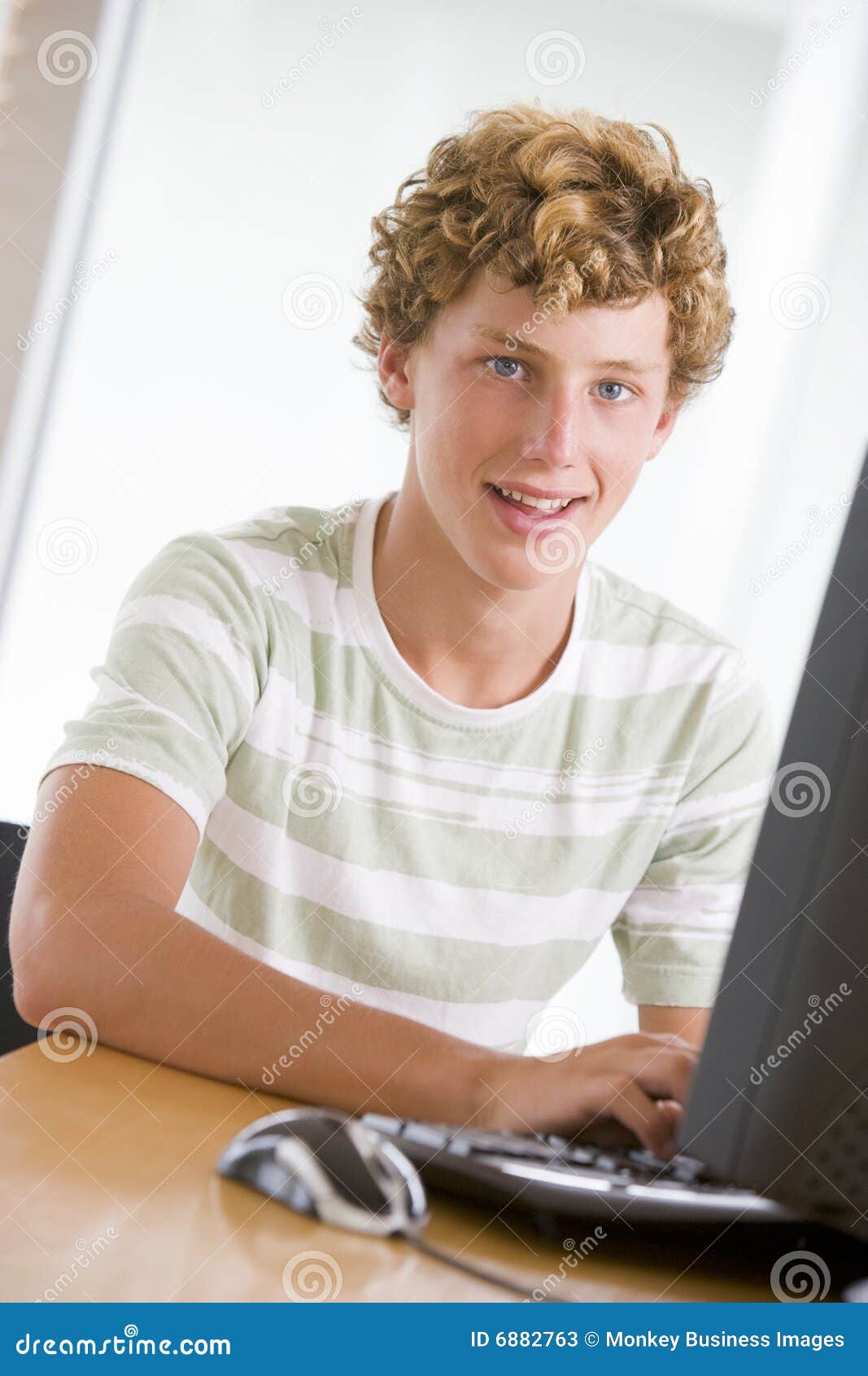 Teenage Boy Using Desktop Computer Stock Image - Image of vertical ...