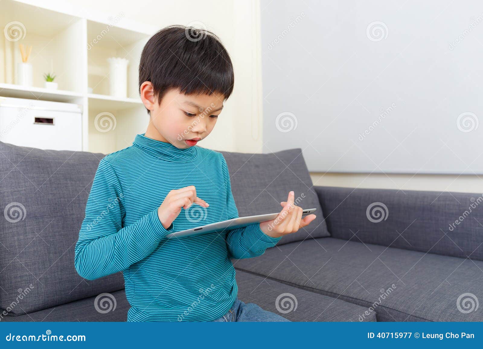 Teenage Boy Using a Digital Tablet Stock Image - Image of asian, screen ...