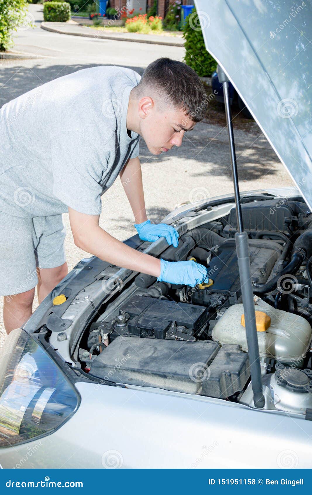 Teenage Boy Working on a Car Stock Photo - Image of teenager, engine ...