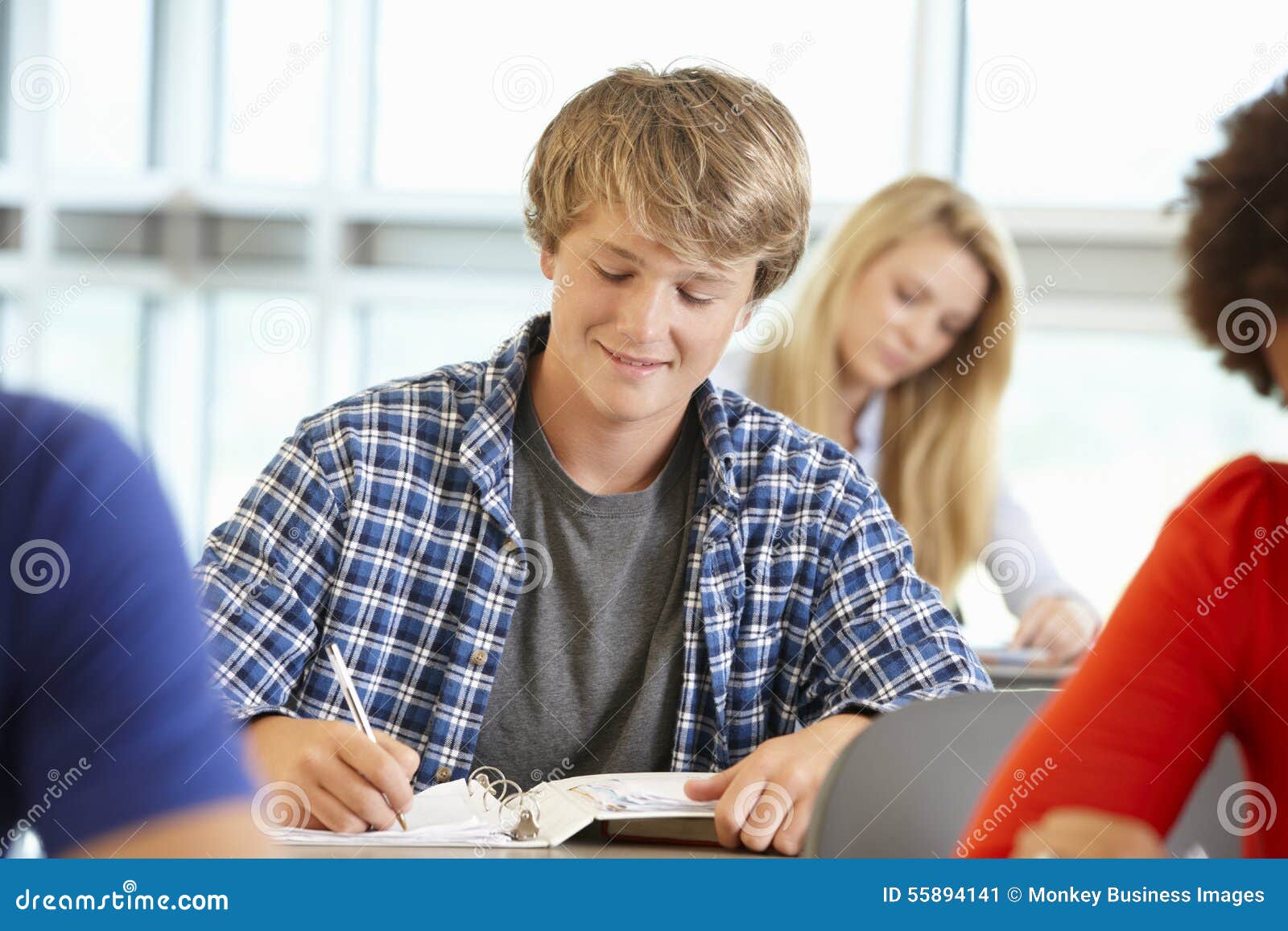 Teenage Boy Working in Class Stock Image - Image of pupils, hispanic ...